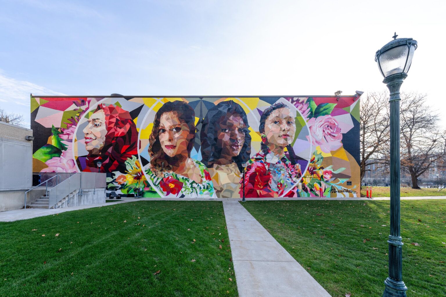 Photo gallery: Artist Mauricio Ramirez restores ‘Our Roots Say That We’re Sisters’ mural ...